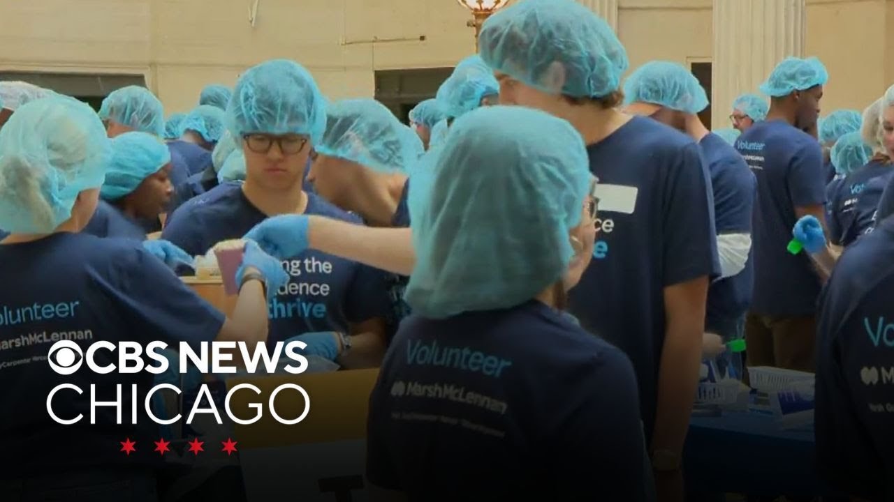Volunteers pack meals for those in need on 9/11 Day
