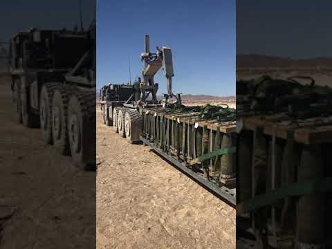 Palletized Load System (PLS) loading up 155 Artillery rounds