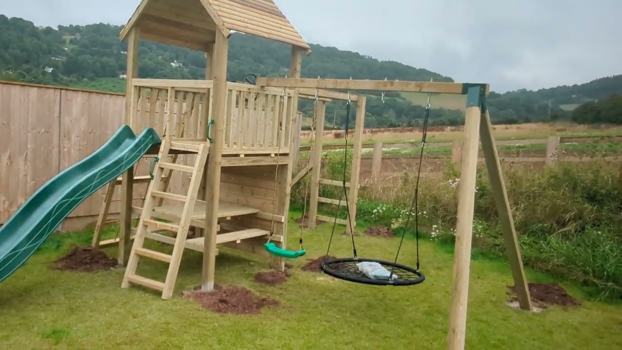 Custom small garden climbing frame, Playset is designed to work in sloping gardens
