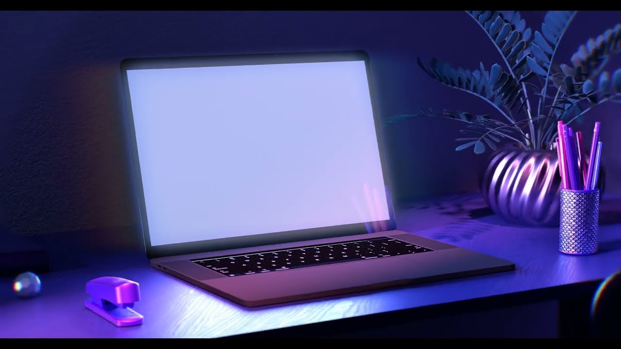 Futuristic Workspace Vibes: Laptop on a Desk Illuminated by Mesmerizing Neon Lights