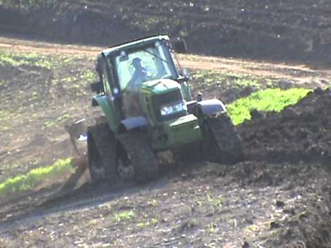 Mascor Soucy Track John Deere Tractor 6930 in Furrow Ploughing on Steep Slopes