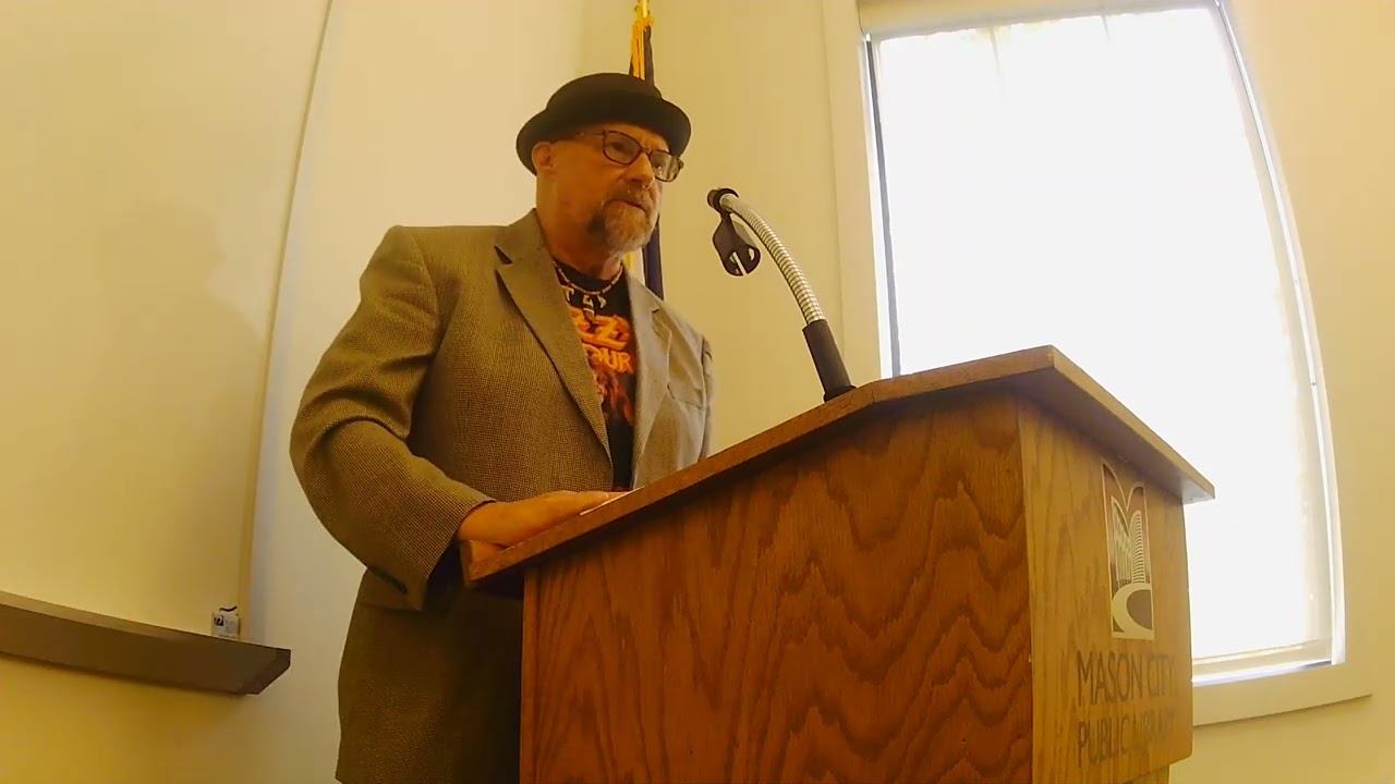 Thomas W. Case reads at the Mason City Public Library from his book, Sleep Always Calls