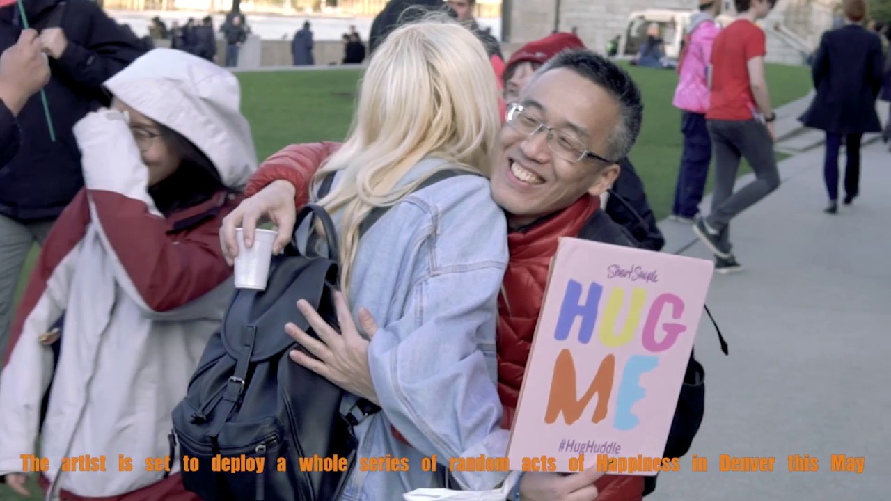 Hug Huddle - a public art intervention by Stuart Semple