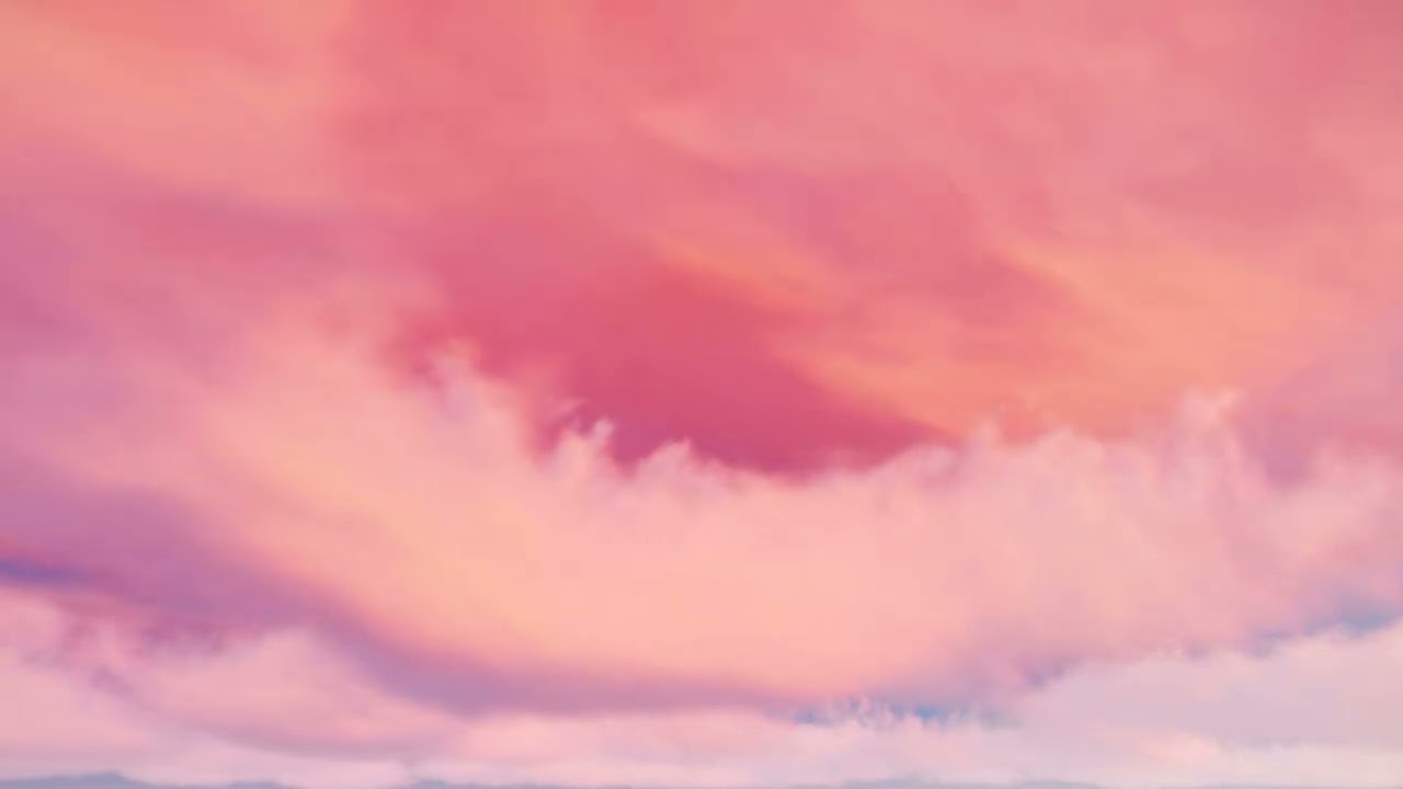 Pink Orange moving Clouds background