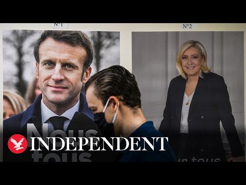 Live: French polling opens as Le Pen takes on Macron