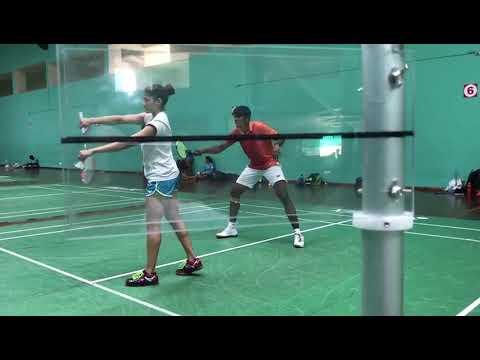 New badminton rules of service .