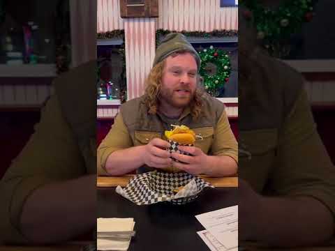 Hey Man eats The Old Man sandwich at Hill Street in Fish Creek, WI