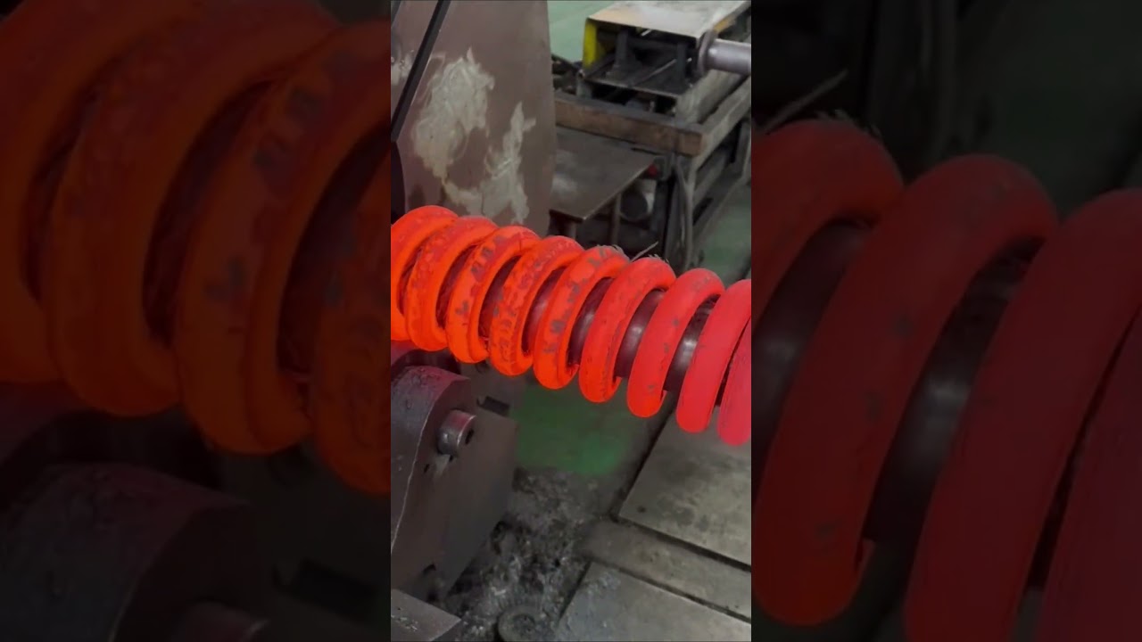 Varm metalstang formet til stor fjeder