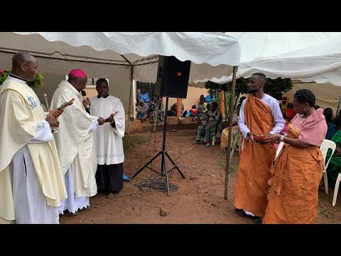 Bishop Jjumba Ordinary of Masaka Diocese Blessing the heir of the late Everest Kayondo (KACITA)
