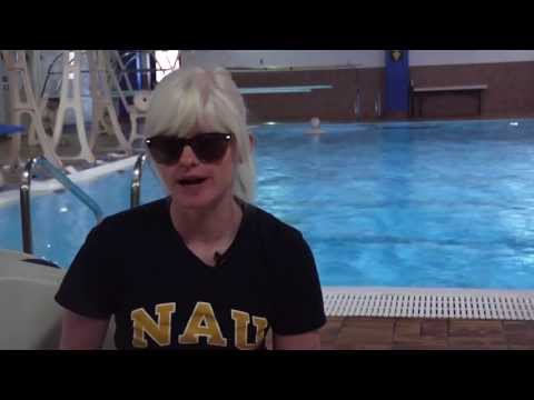 Visually impaired student trains for long distance swim