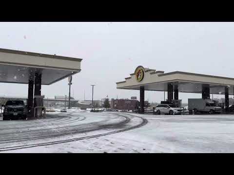 Snow coming down at Bucee’s in Denton, Texas