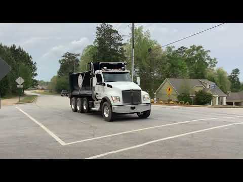 Kenworth T880 dump trucks and Peterbilt 567 dump truck and D&J Enterprises Inc.