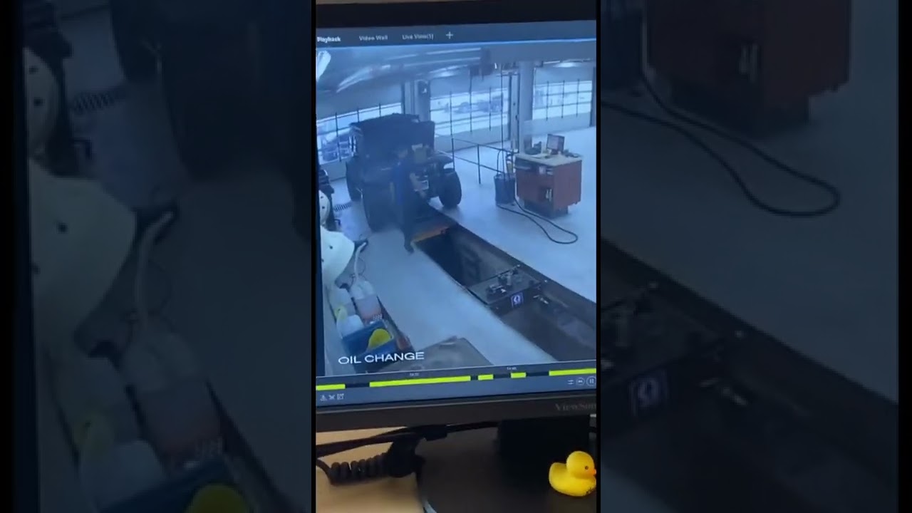 Lube Guy falls down creeper pit at work. #shorts #fail #cars #funny #jeep #fyp