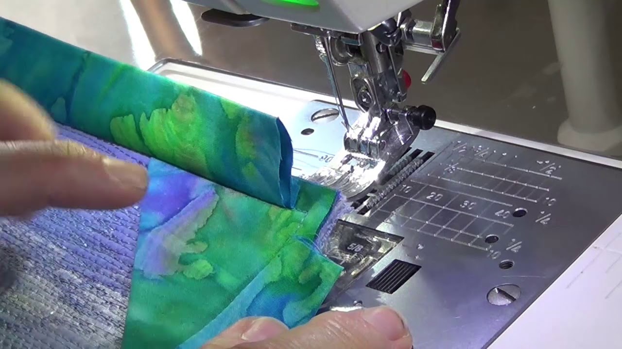 Binding an artquilt without seeing it - faced binding