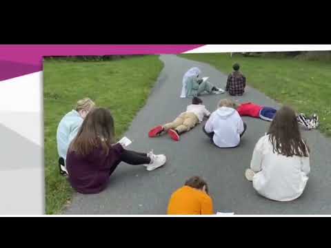 Ms. Riggs Accepts Her Award From The PM – Macdonald Drive Junior High