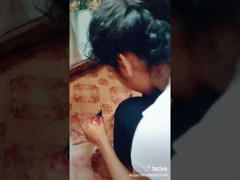 Sl Beautiful 02 girls Applying Nail polish