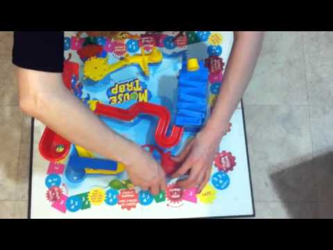 Putting together a Mouse Trap game while blindfolded.