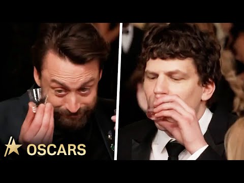 Kieran Culkin & Jesse Eisenberg Do SHOTS w/ Mario Lopez At 2025 Oscars Red Carpet