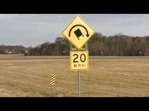 Truck Rollover Curve and M.P.H. Signs