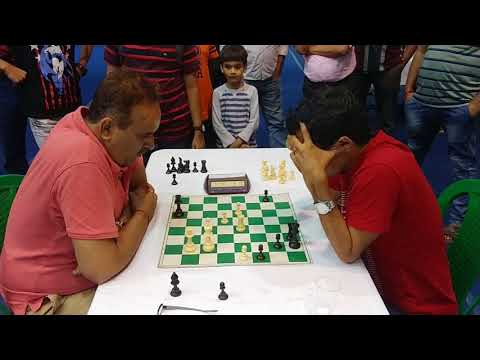 Veteran trainer defeats 2600+ GM