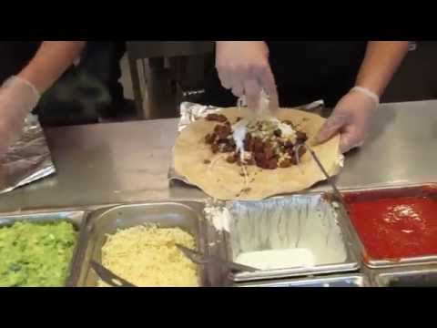 Speedy Chicken and Steak Burrito Made in Chipotle Mexican Grill in Fresno, California