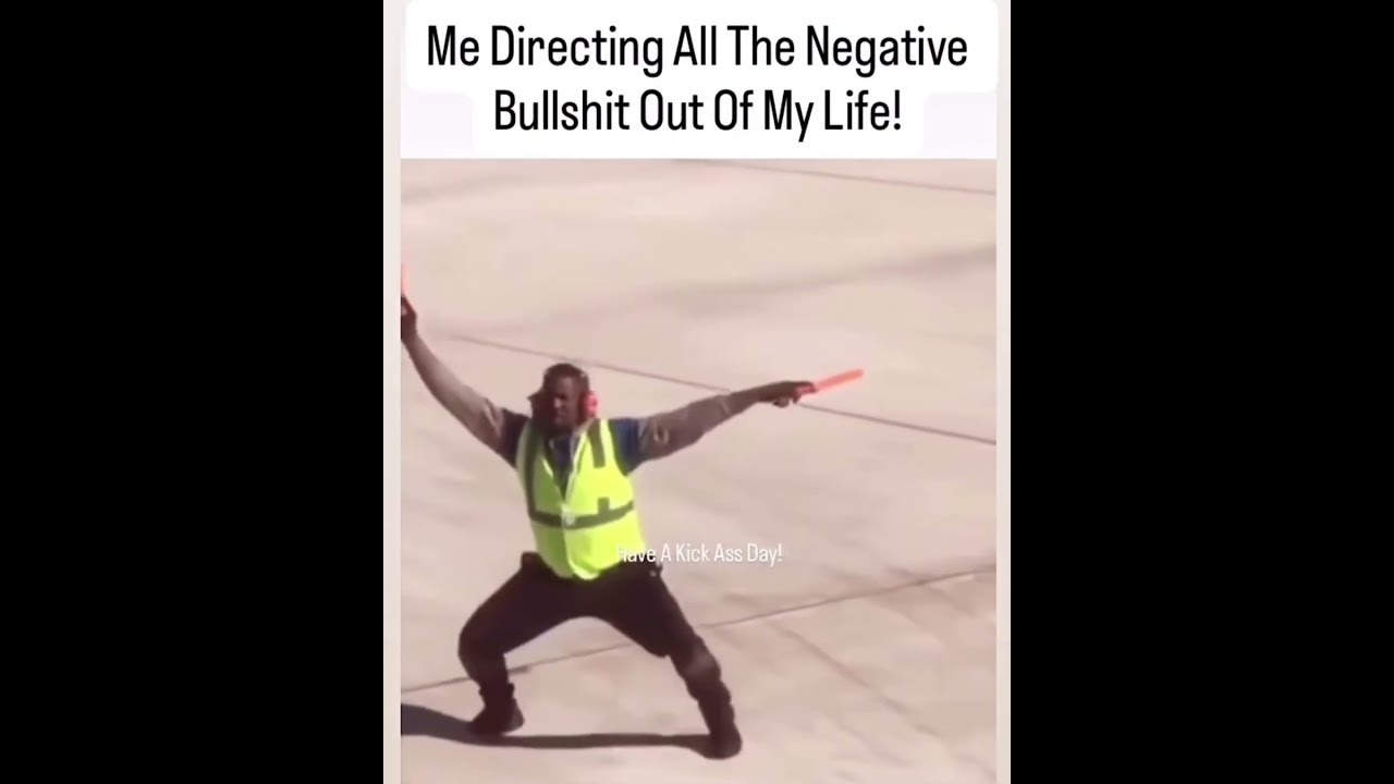 This airport worker isn’t just guiding planes