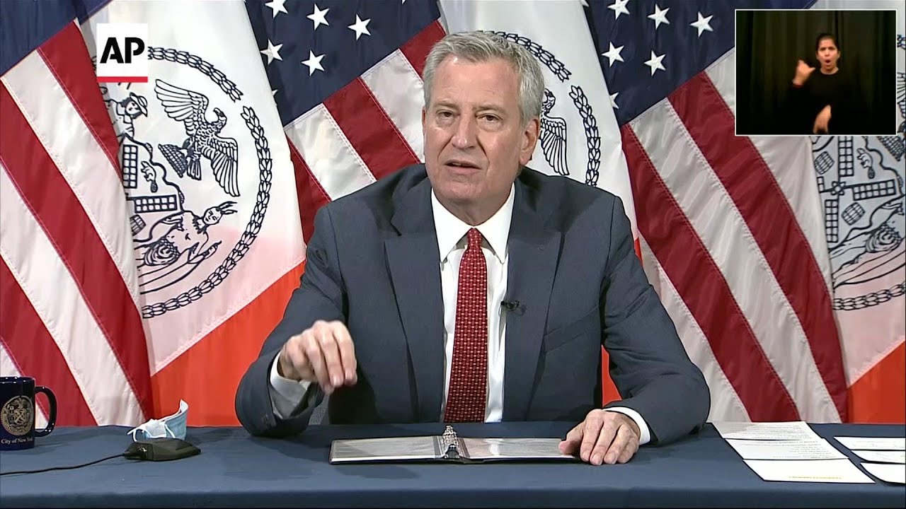 NYC to reopen schools, even as virus cases spike