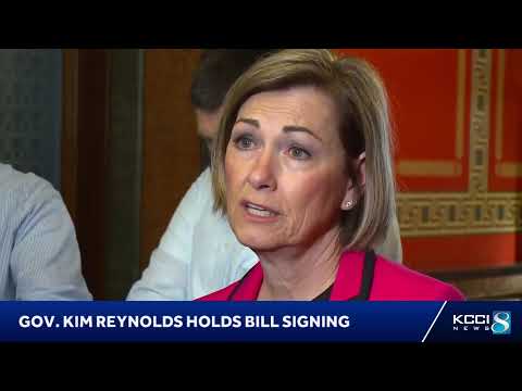 Gov. Kim Reynolds holds bill signing