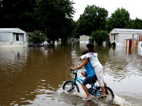 Swamped by storms: Intense flooding overwhelms Tennessee and Arkansas