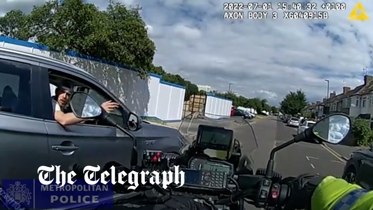 Watch: Met Police officer rammed off motorbike