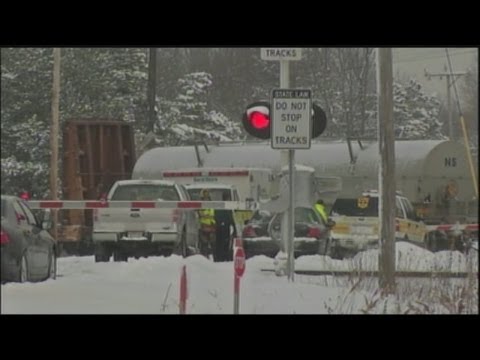 Train collides with car in Angola