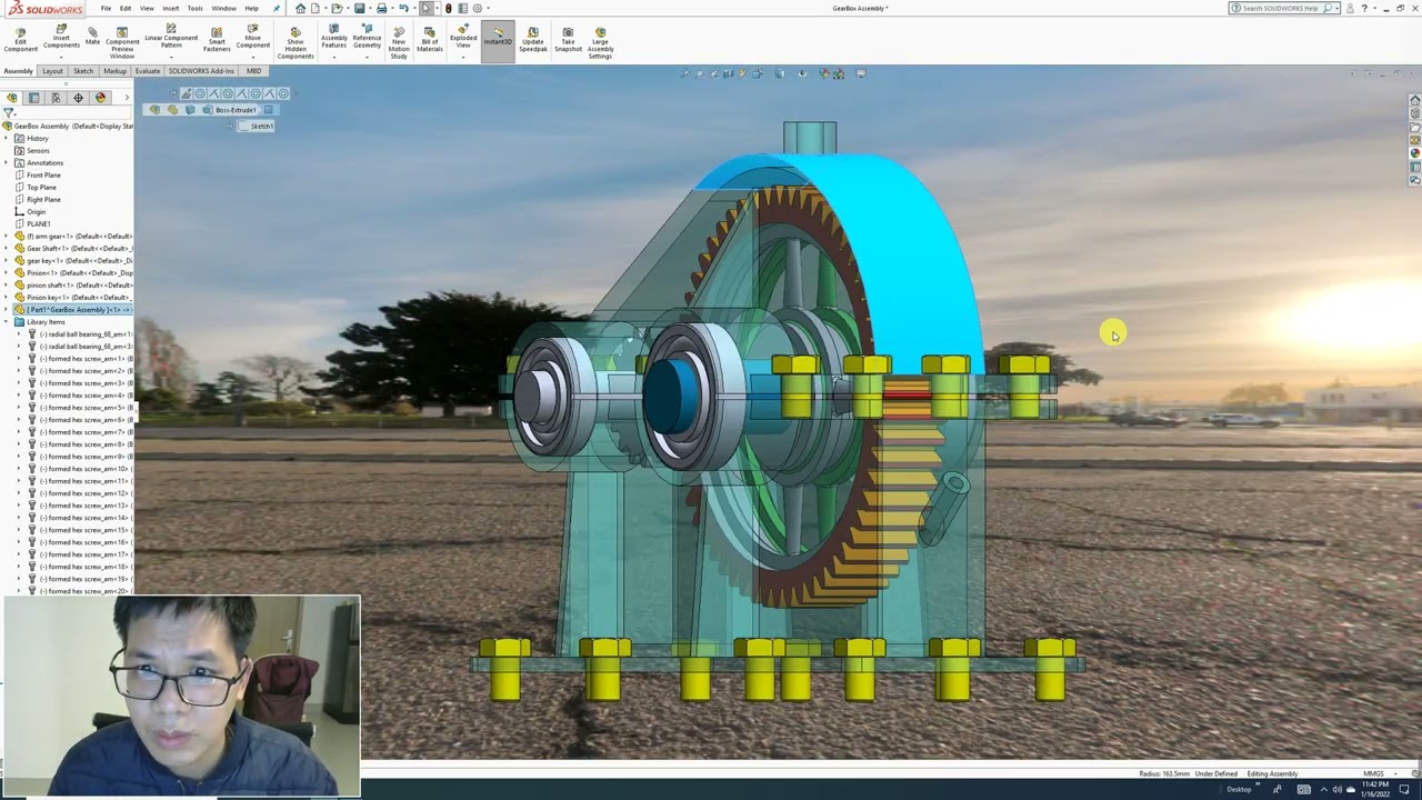 Two intermeshing gears transmitting rotational motion