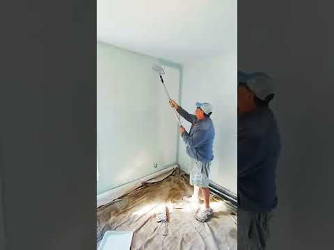 Painting A Wall with Behr frosted jade eggshell finish