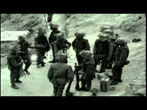 45th Infantry Division soldier of the US Army checks war equipment at a hillside ...HD Stock Footage