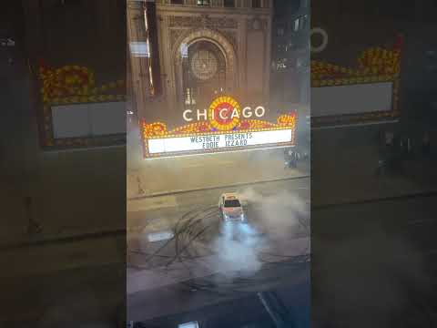 Car does donuts outside ABC7 Chicago's studio with police nearby