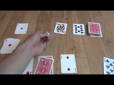 Dice rolling game with playing cards