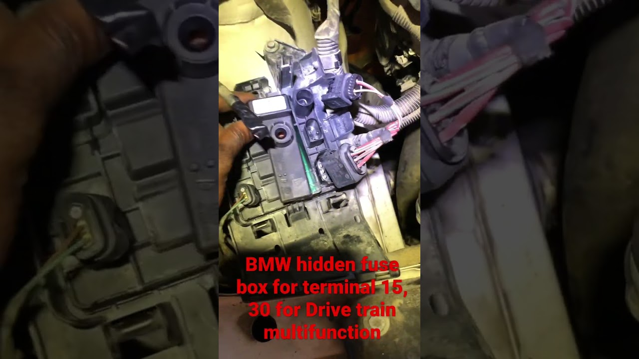 BMW 3 series drive train multifunction in the dashboard.  Hidden fuse box for power supply 15,30