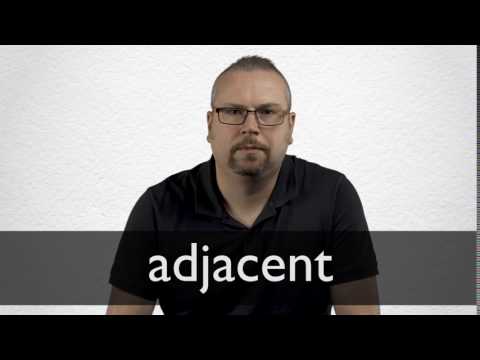 How to pronounce ADJACENT in British English