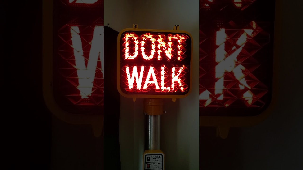 Flashing Walk on an ICC Neon Pedestrian Signal