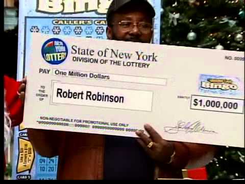 $1M lotto winner is presented with check