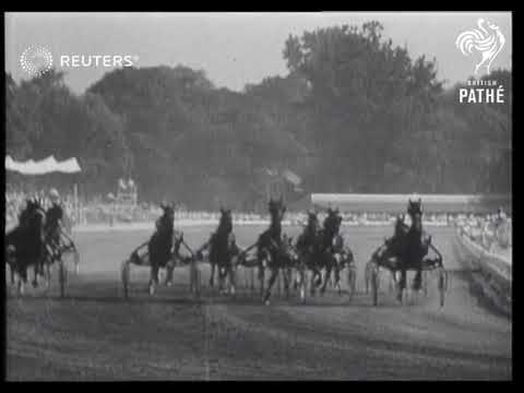 Horses compete at 1947 Hambletonian harness racing event (1947)