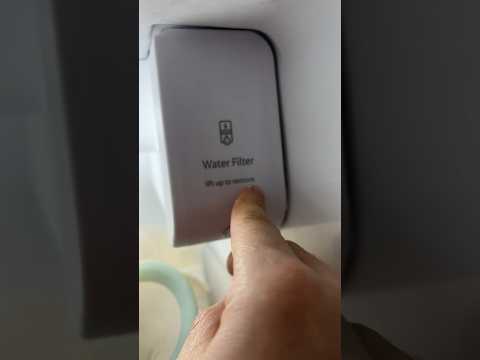 How to remove water filter from whirlpool fridge?