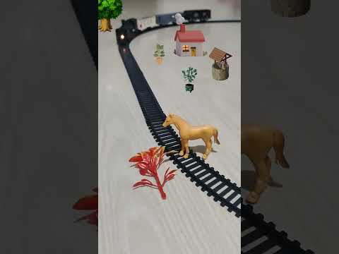 Horse is eating grass on the railway track and train is approaching fast | Rail King | Ranch Horses