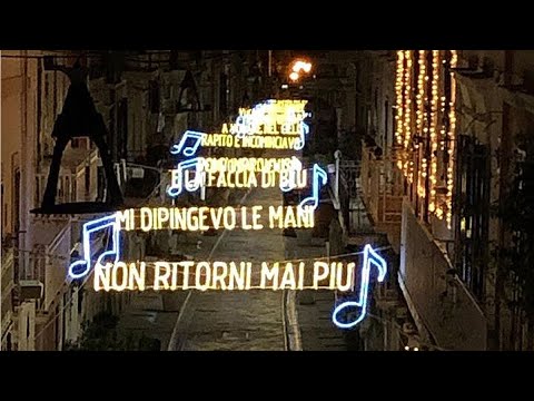 Singing in Beautiful Polignano a Mare in Puglia Italy