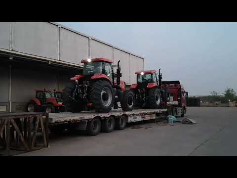 KAT 2204-B Tractor loaded on to flatbed truck Hard time for machinery industry under covid pandemic