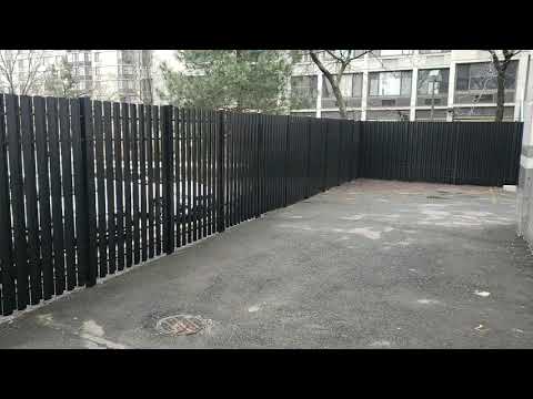 8'- Black Specrail S-11 Privacy Panel Aluminum Fencing with Matching Gates.