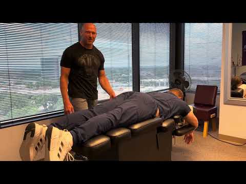 Seattle Chiropractor Dr Skylar Pond Praticing The Ring Dinger® Adjustment On Houston Chiro Dr T