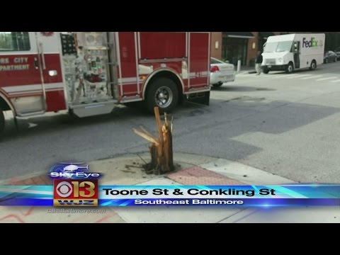 A Dump Truck Causes a Utility Pole to Fall in Canton