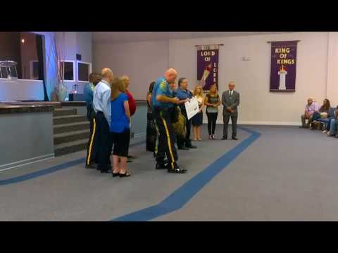 Presenting TPSO with $15,000 to purchase Bullet Proof Vests
