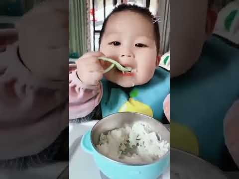 baby eating food 😂